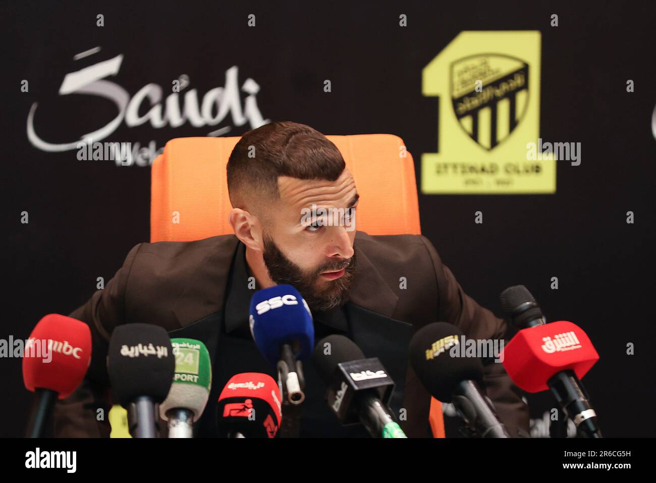 Saudi soccer team Al Ittihad player Karim Benzema speaks during a press ...