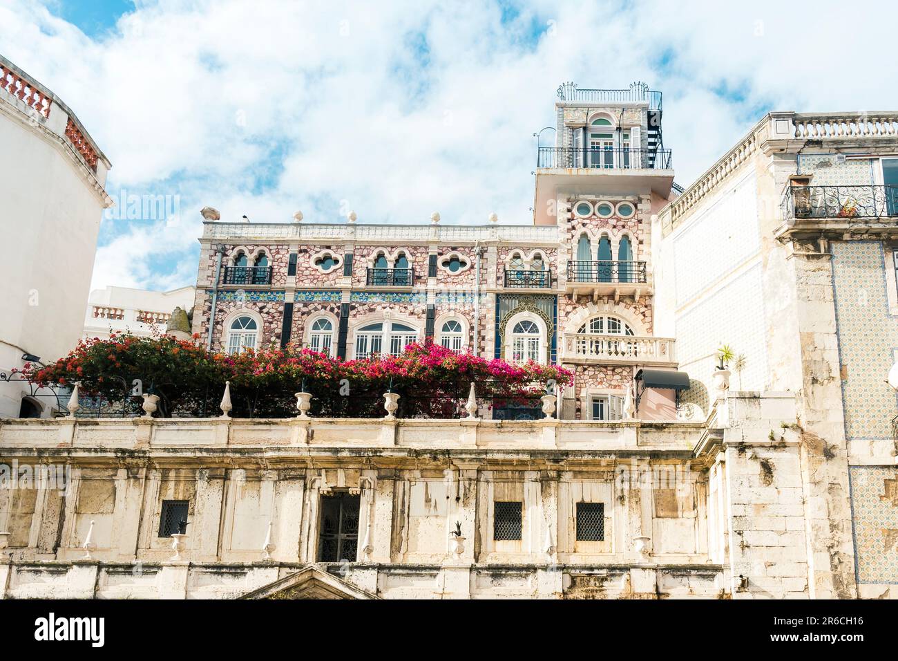 Chafariz d' el Rei palace in Alfama district of Lisbon with blooming ...