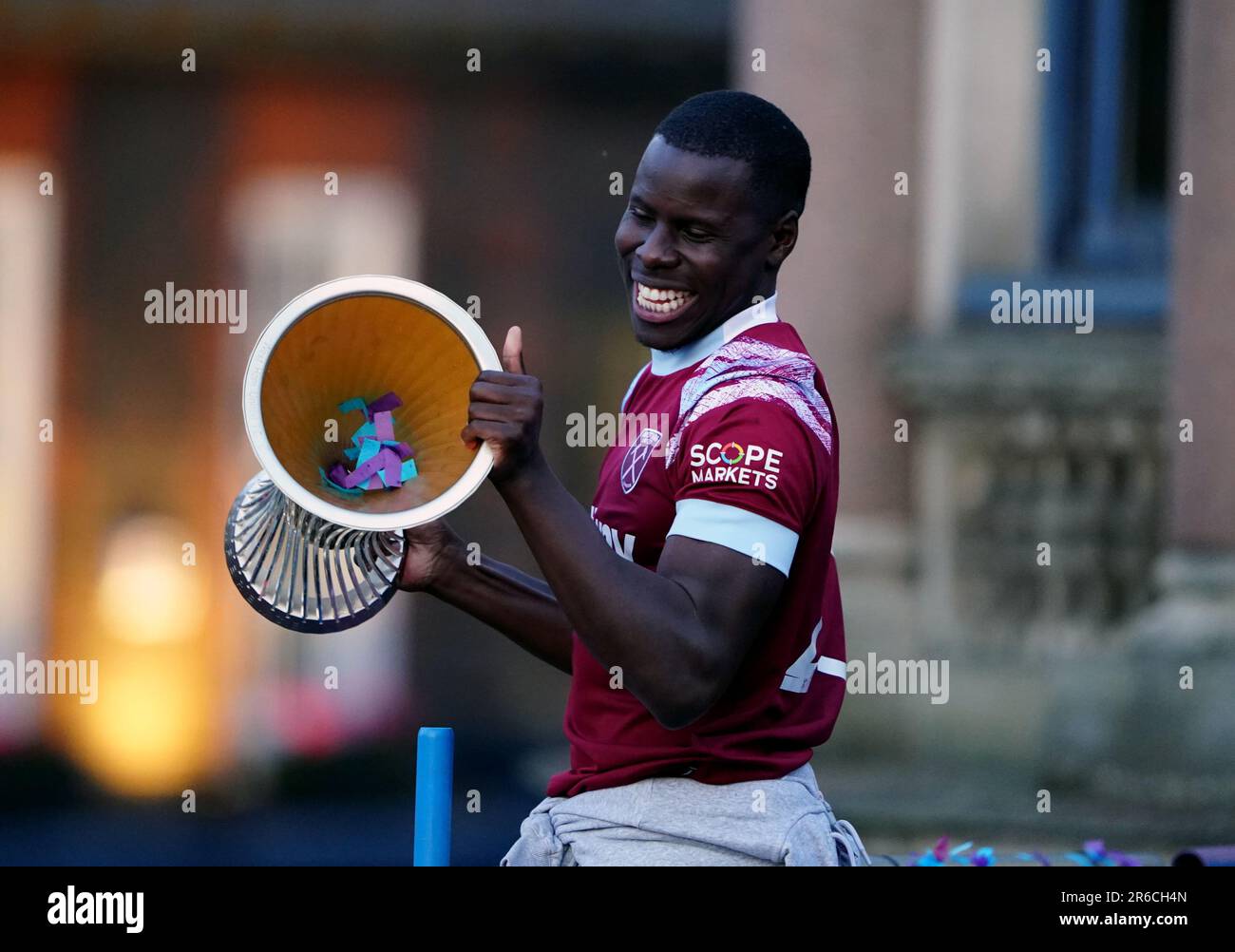 West Ham United's Kurt Zouma celebrates with the trophy at the Old Town ...