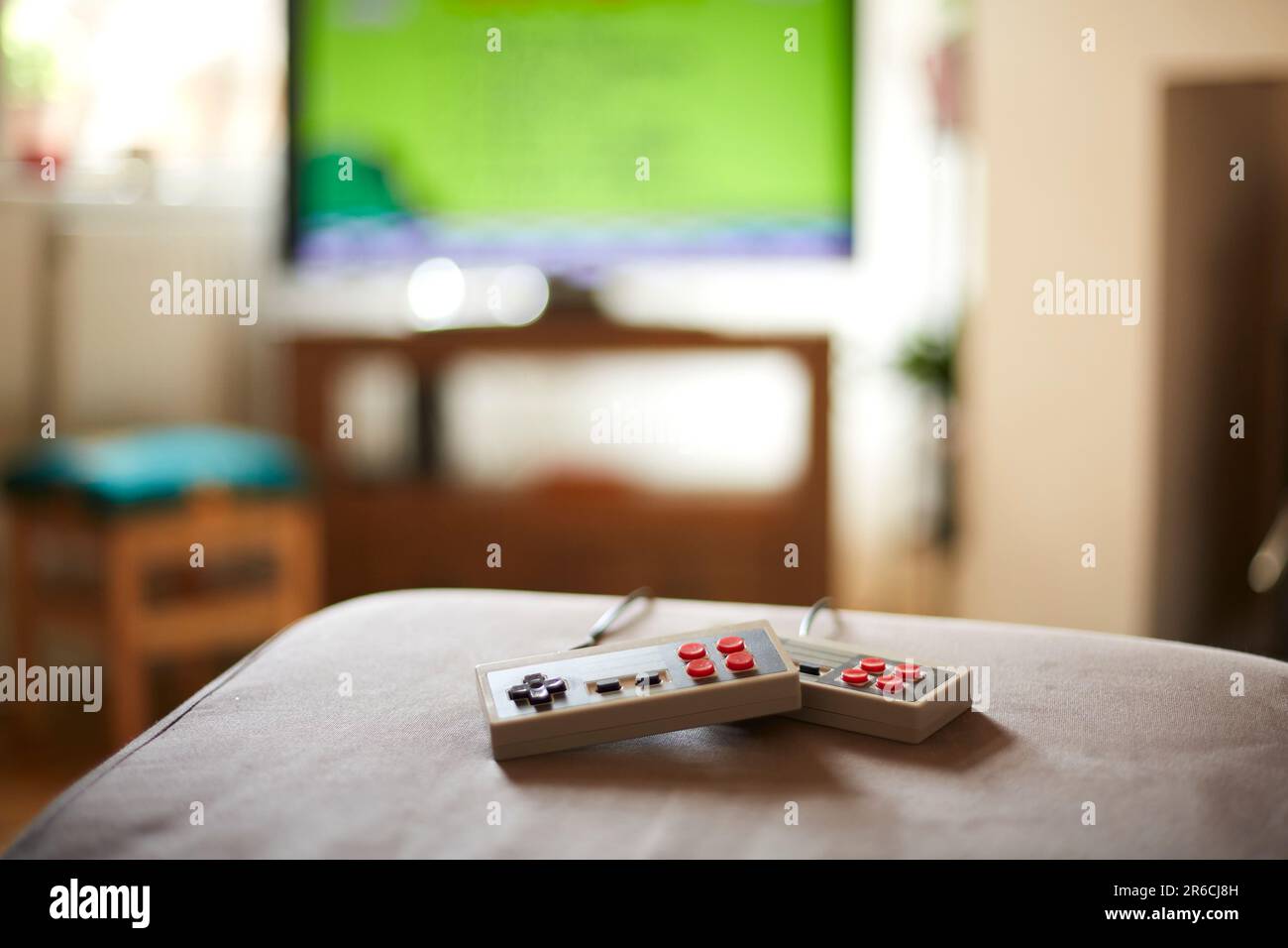 Playing old vide games nintendo Stock Photo - Alamy