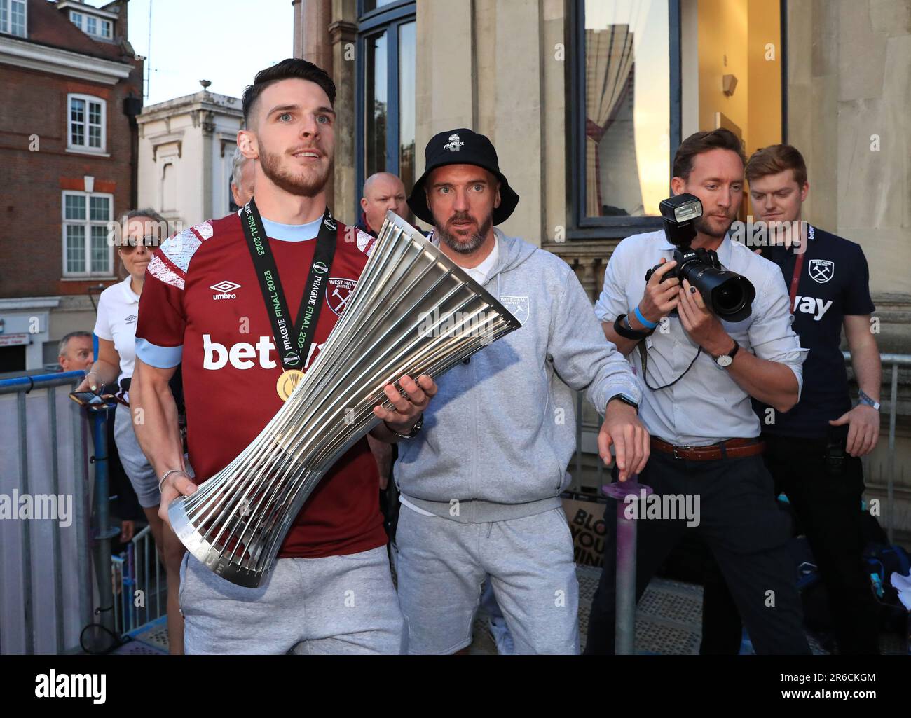 West Ham United's Declan Rice carries the trophy at the Old Town Hall ...