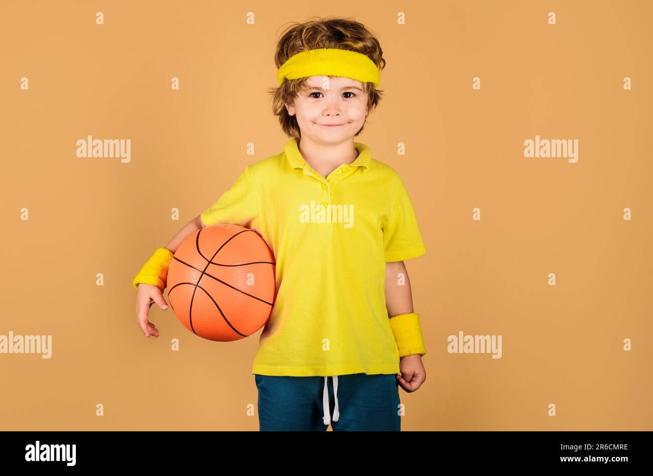 Cute kid with basketball. Child boy playing basketball. Sporty child ...