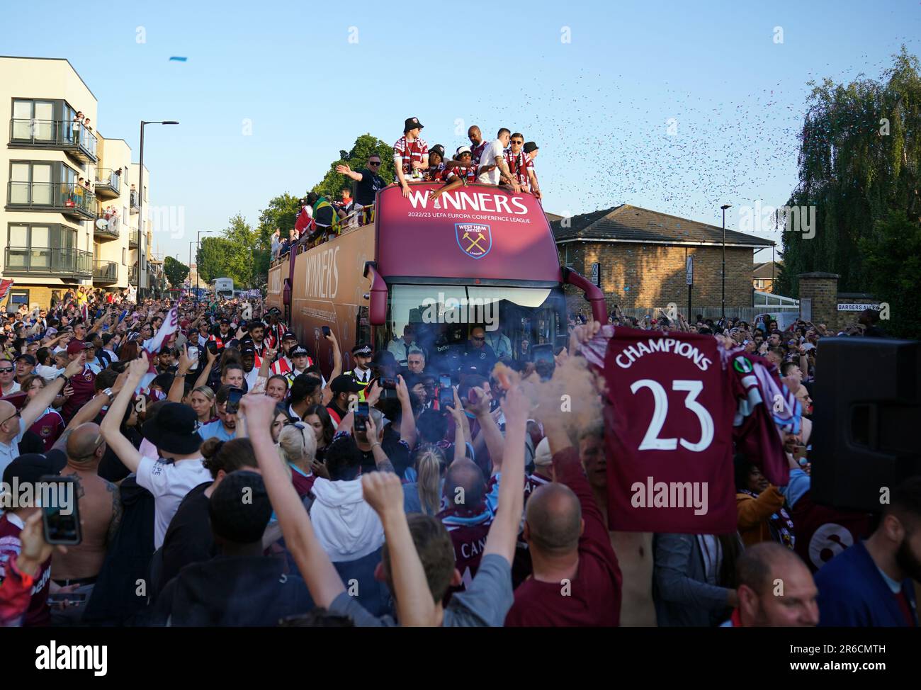 West Ham United players celebrate during an open top bus parade ...