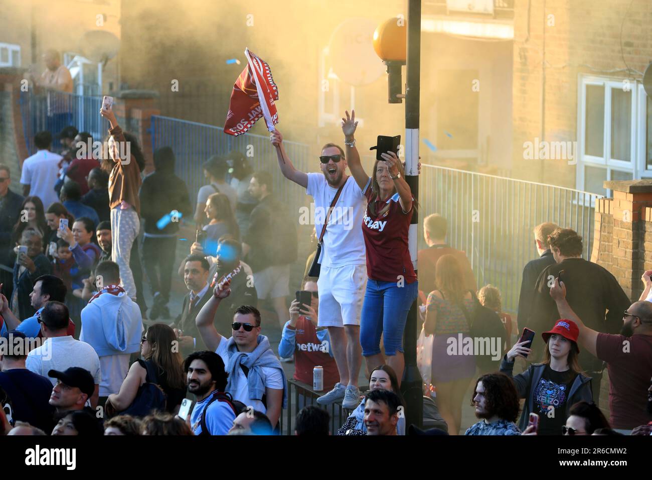 Fans gather to watch West Ham United's open top bus parade through ...