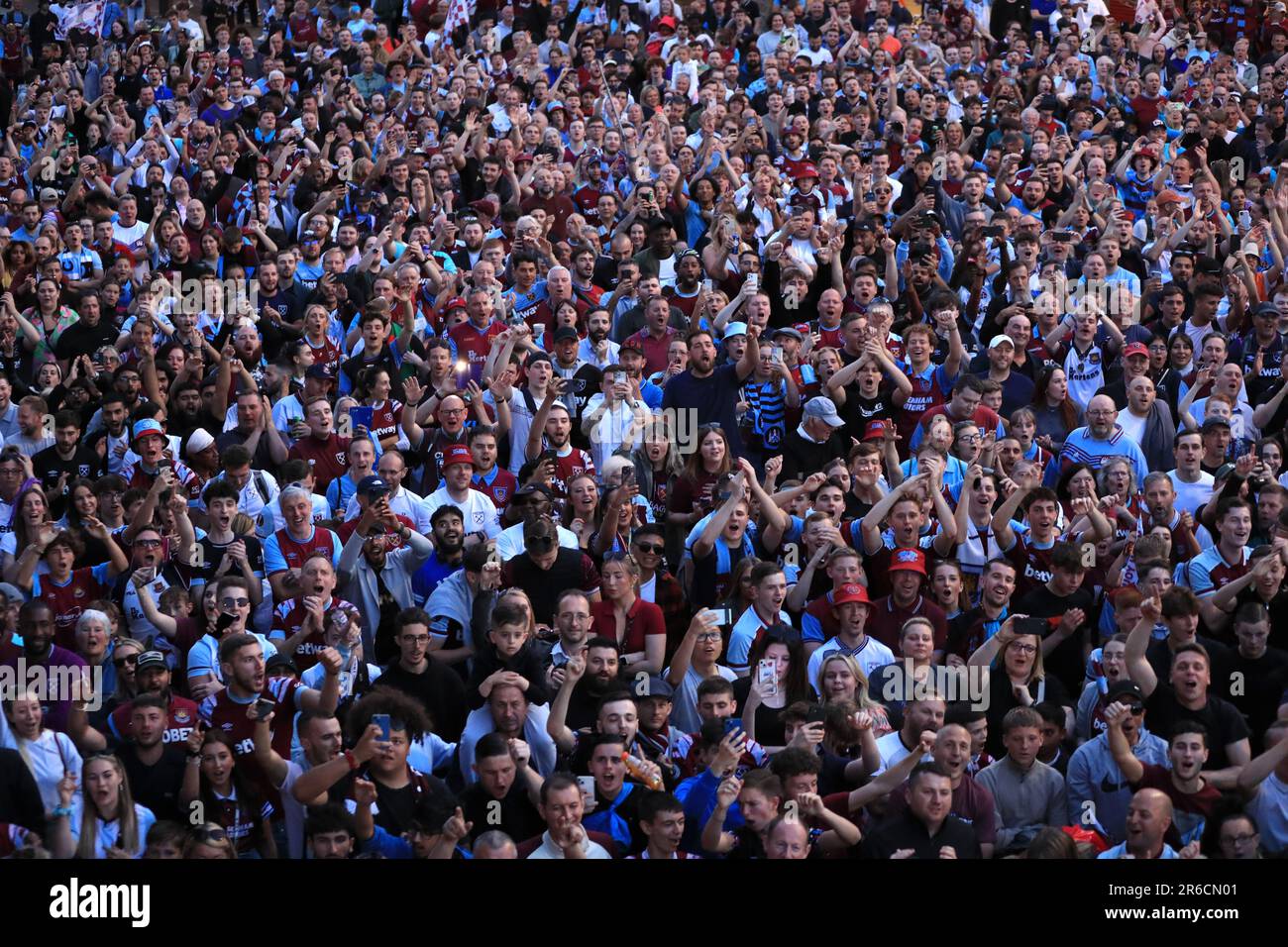 Fans gather to watch West Ham United's open top bus parade through ...