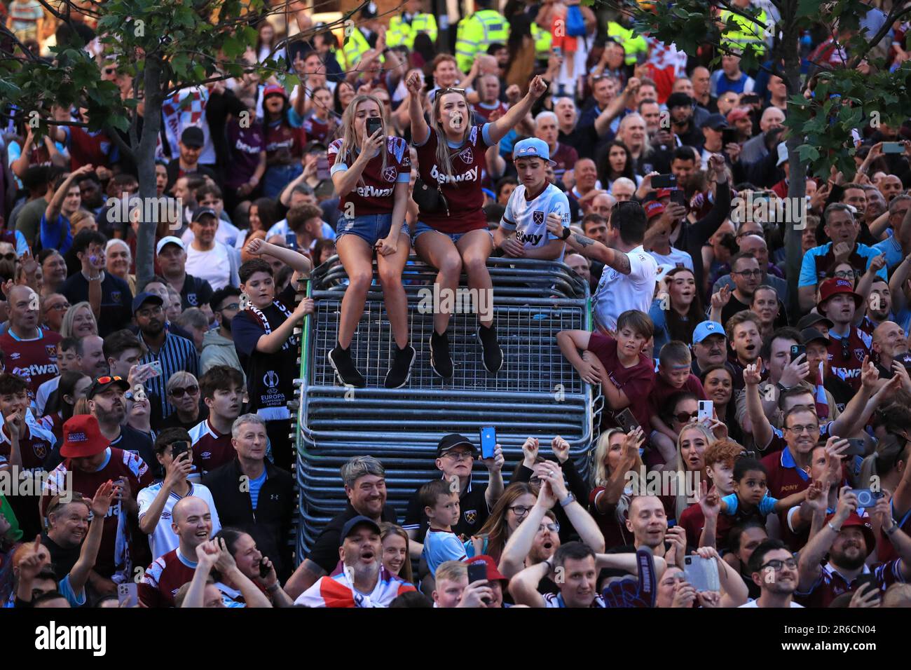 Fans gather to watch West Ham United's open top bus parade through ...