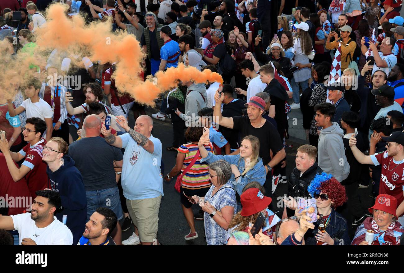 Fans gather to watch West Ham United's open top bus parade through ...