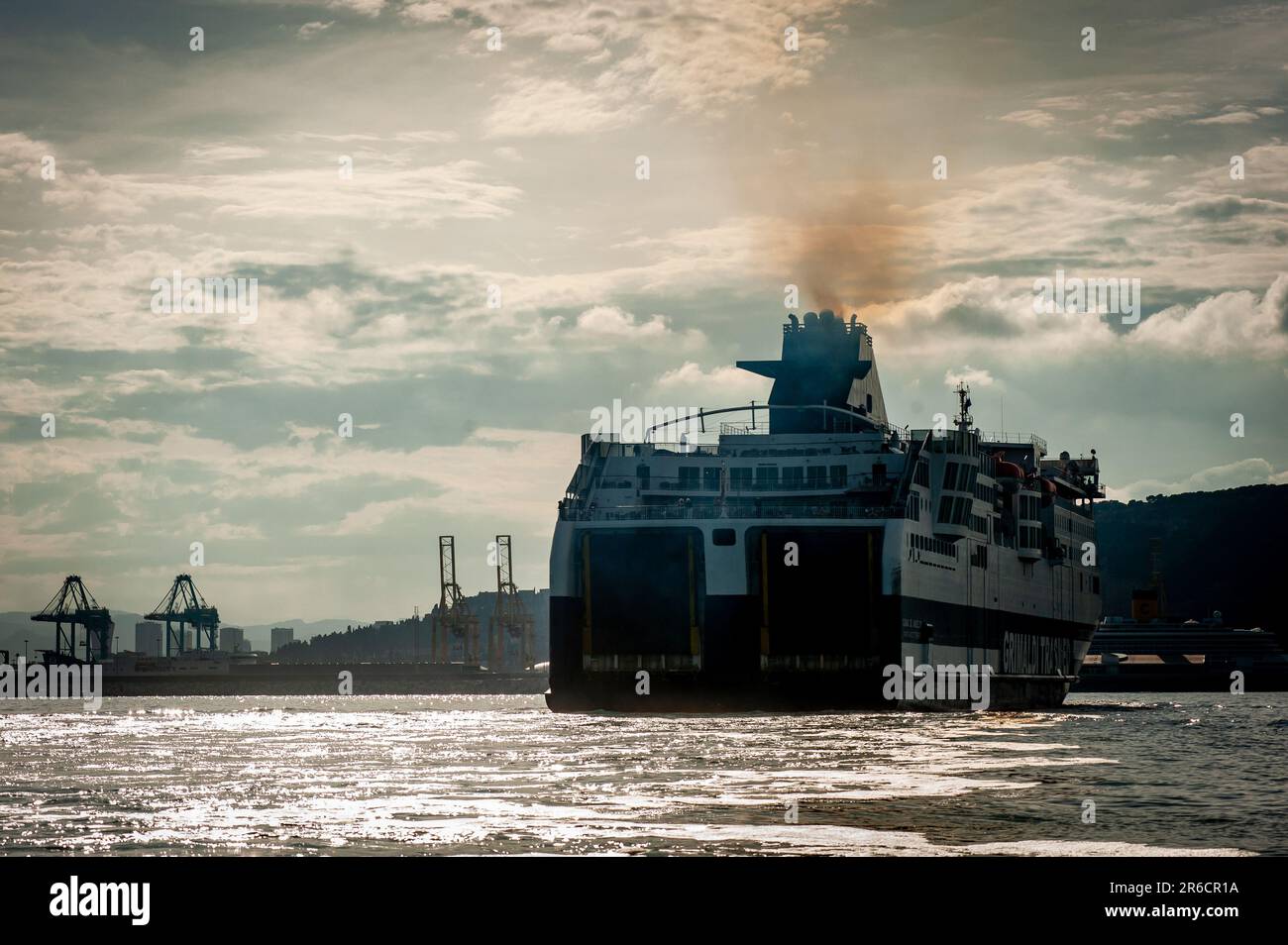 Ferry ship smokestacks gives off smoke while heading the port of ...