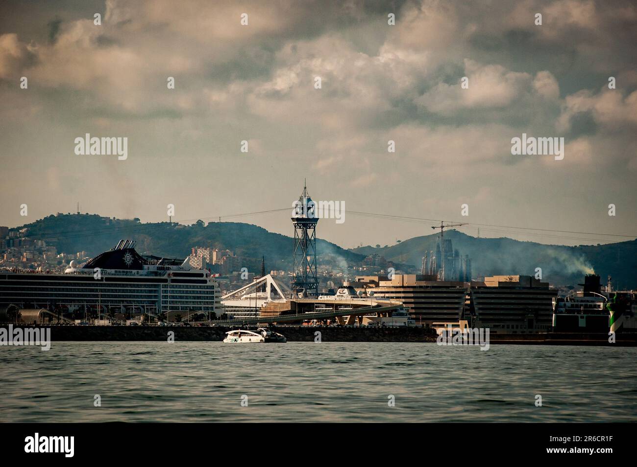 Cruise and ferry ships smokestacks give off smoke in the port of ...