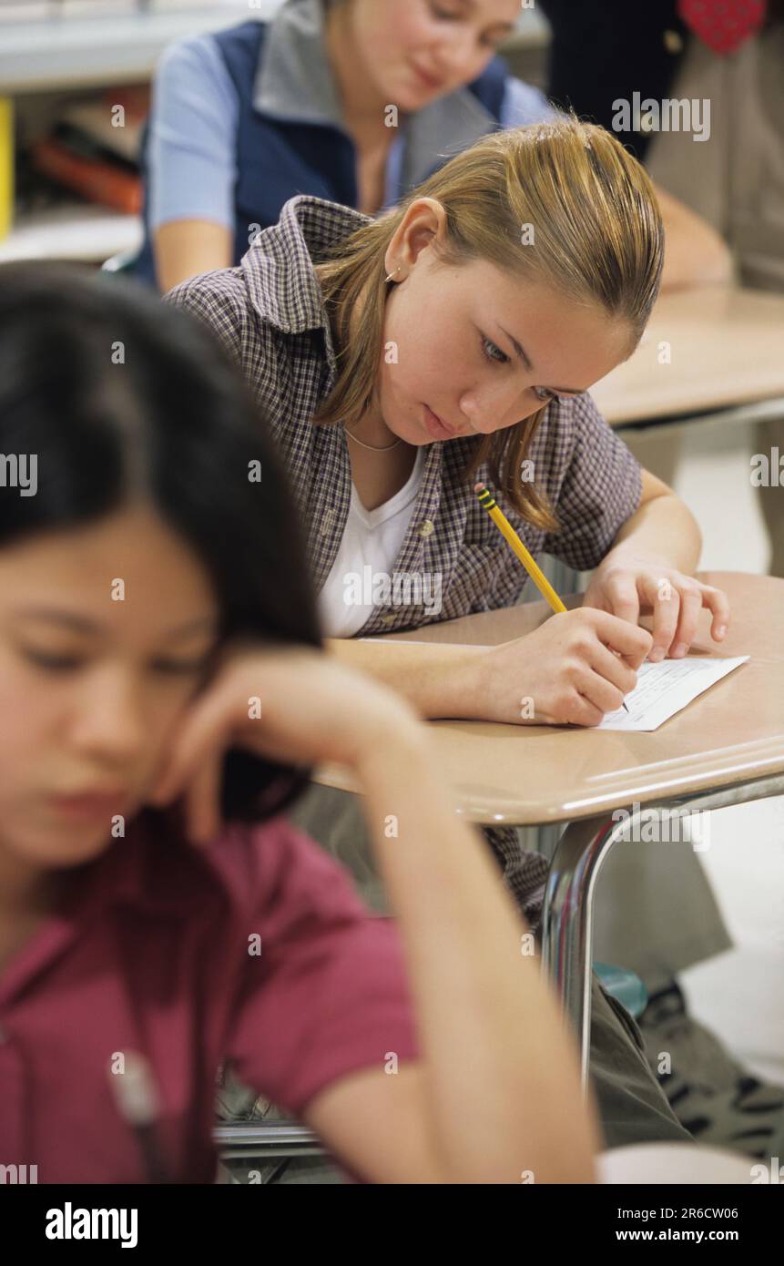 female student taking an Iexam in class Stock Photo - Alamy