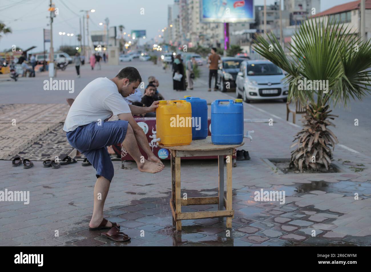 June 8, 2023, Gaza City, The Gaza Strip, Palestine: A man cleans his ...
