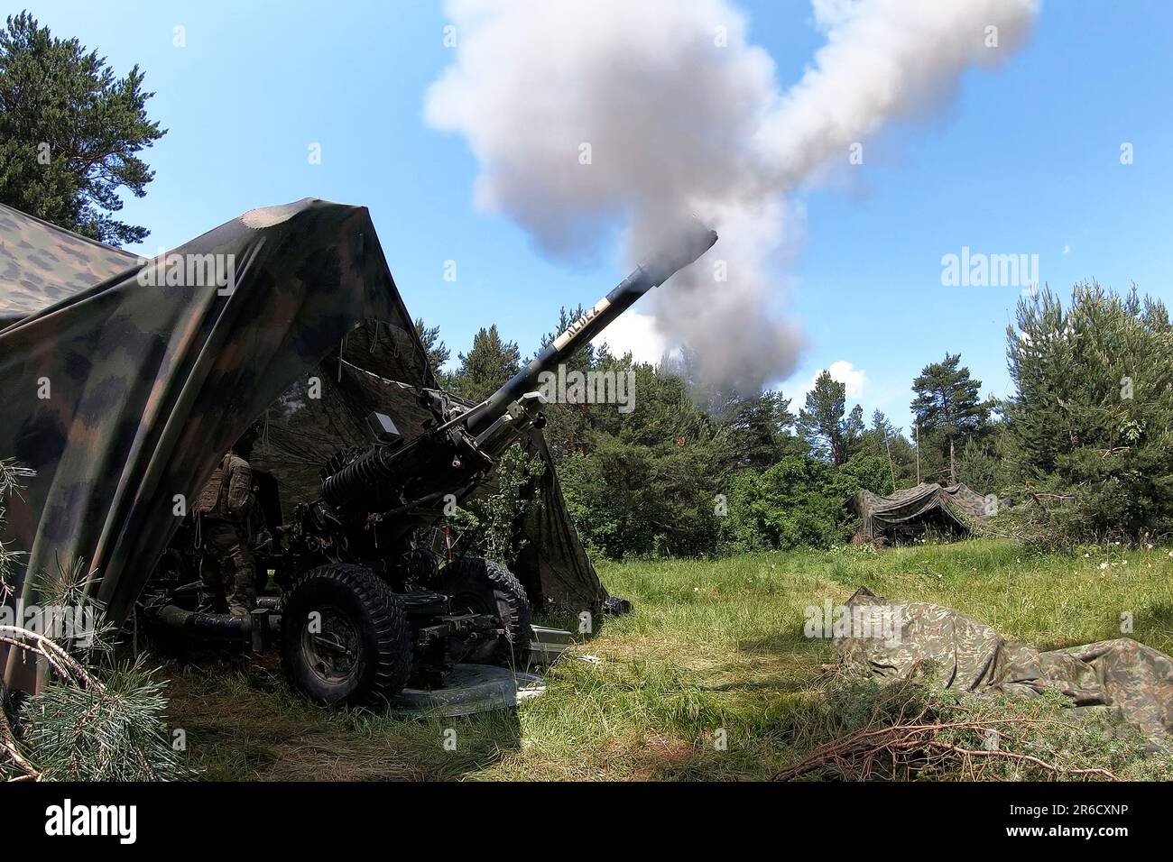 U.S. Army paratroopers assigned to Battery A, 4th Battalion, 319th Airborne Field Artillery ...
