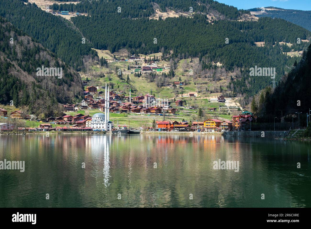 Mosque reflected in the clear waters of Uzungöl Lake, Çaykara District ...