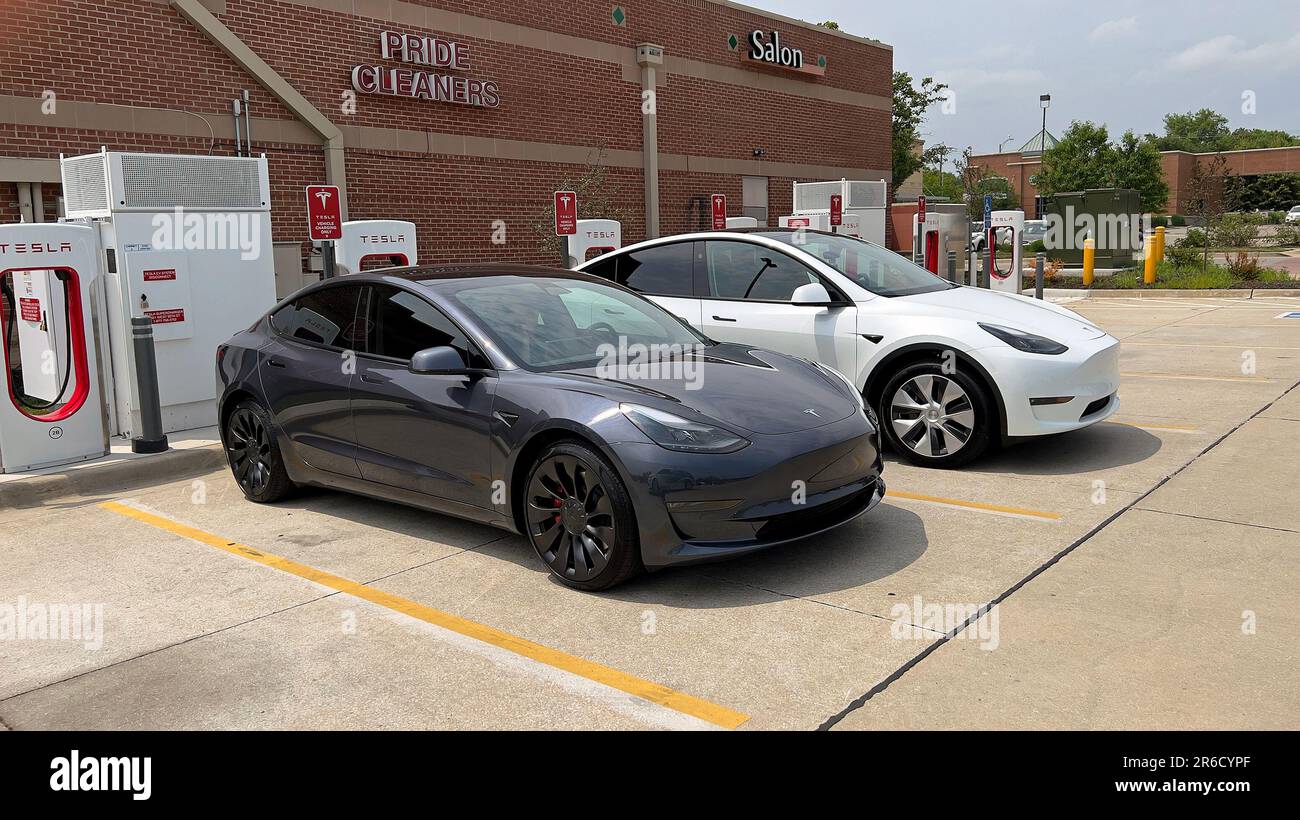 OVERLAND PARK, KANSAS - JUNE 8, 2023 Tesla Model Y’s are plugged in and ...