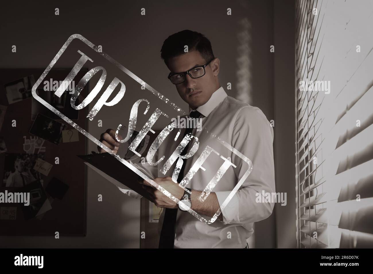 Classified information of investigation. Detective working in office ...