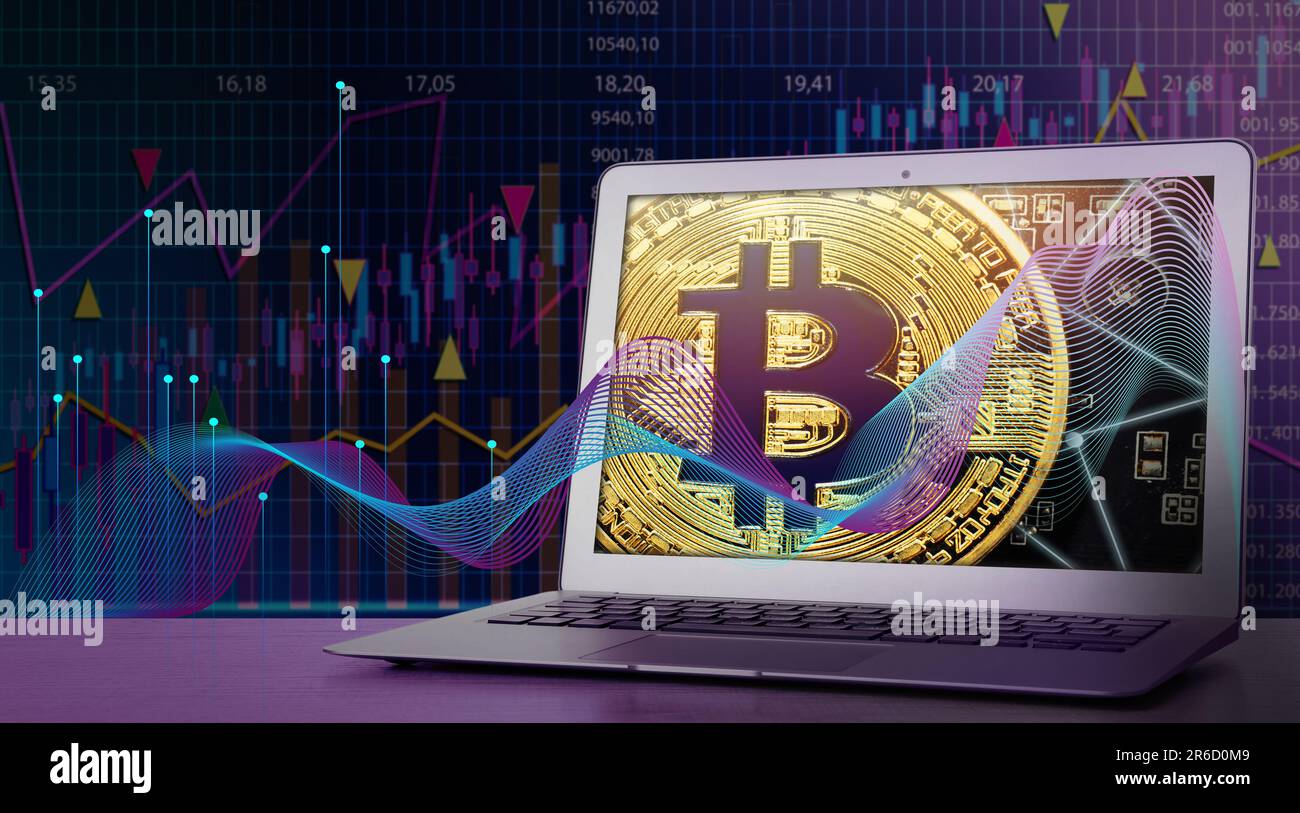 Digital currency security. Laptop with bitcoin on screen on table. Data ...