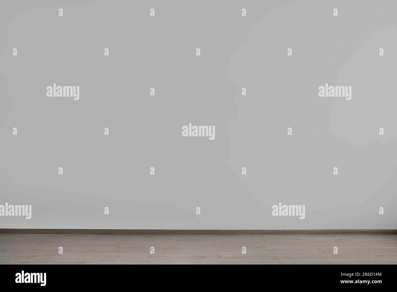 Empty renovated room with beautiful white wall Stock Photo - Alamy