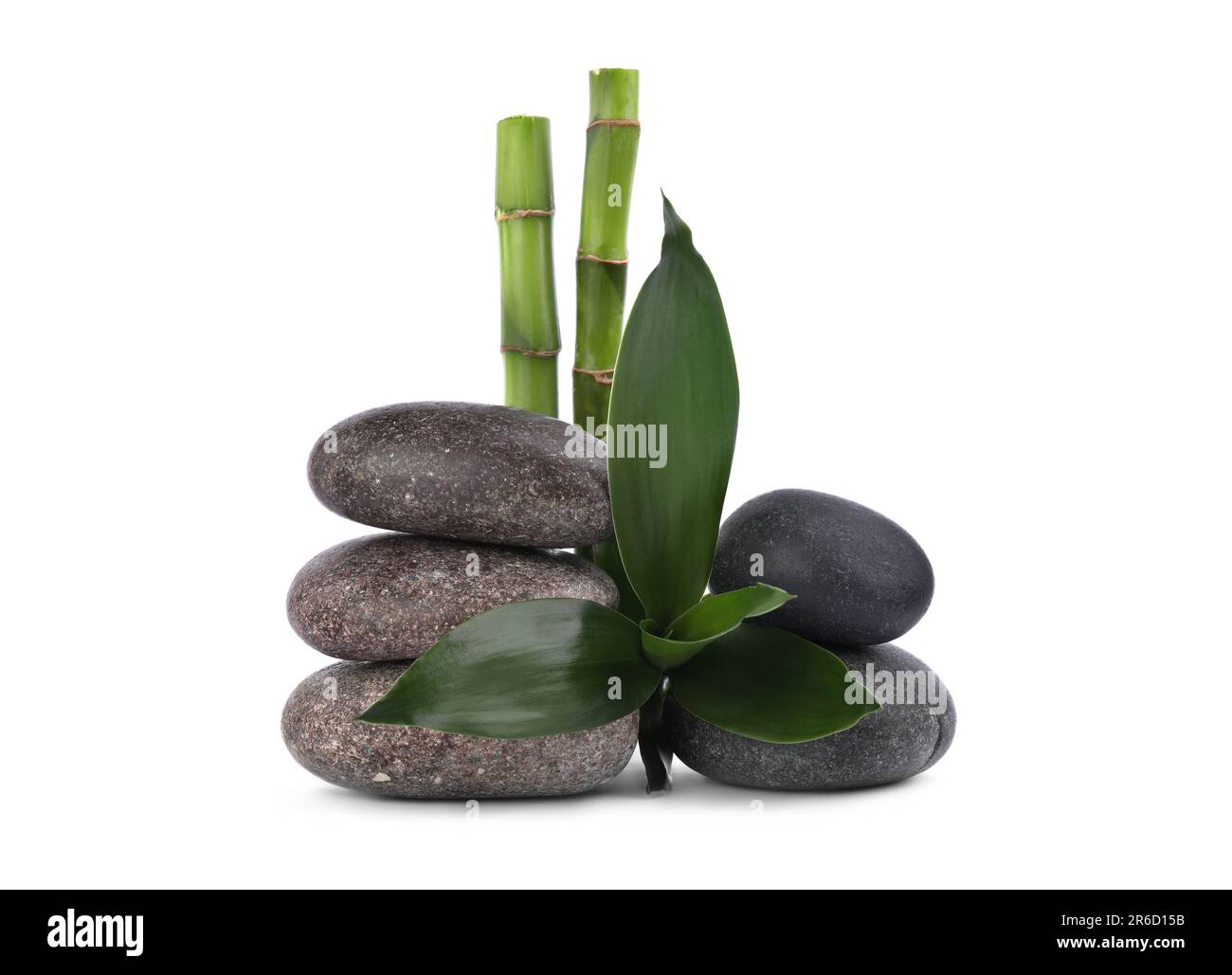 Stacks of spa stones and bamboo on white background Stock Photo - Alamy