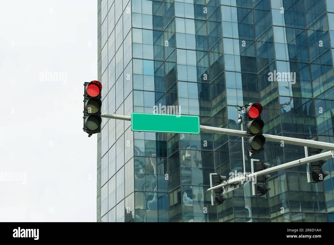 Overhead traffic lights in city. Road rules Stock Photo - Alamy