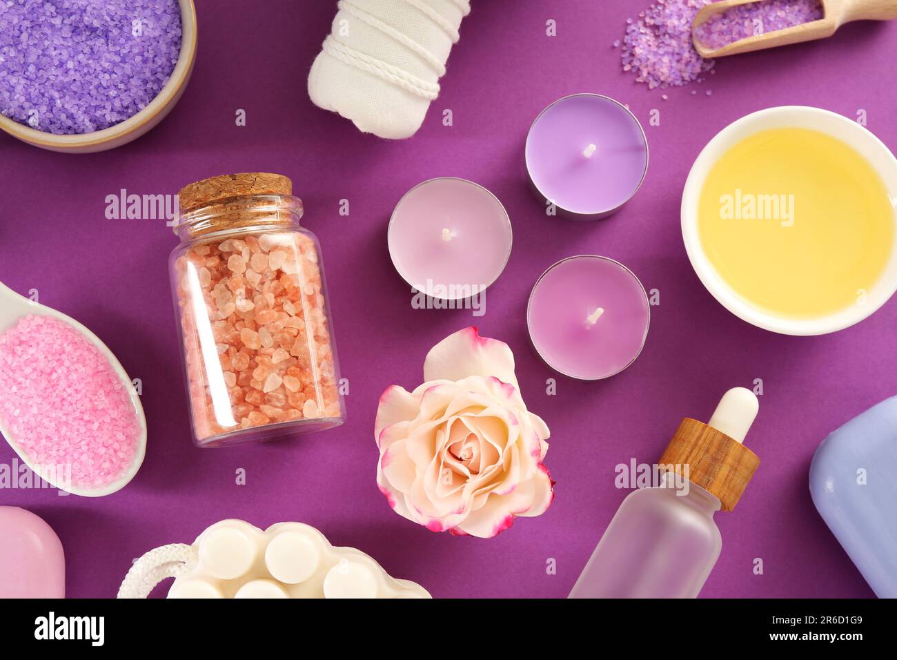 Flat lay composition with aromatic sea salt on purple background Stock ...
