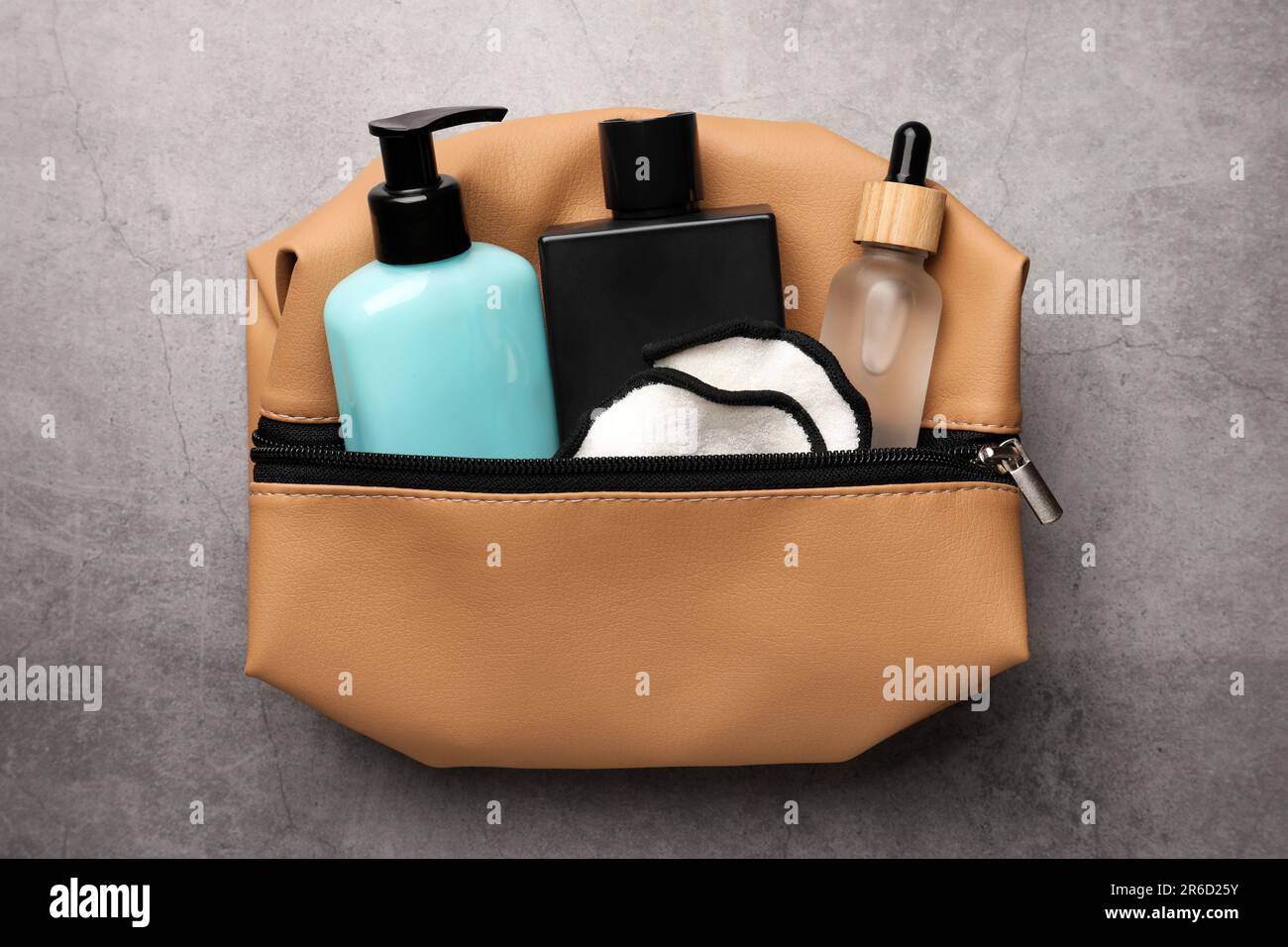Preparation for spa. Compact toiletry bag with different cosmetic ...