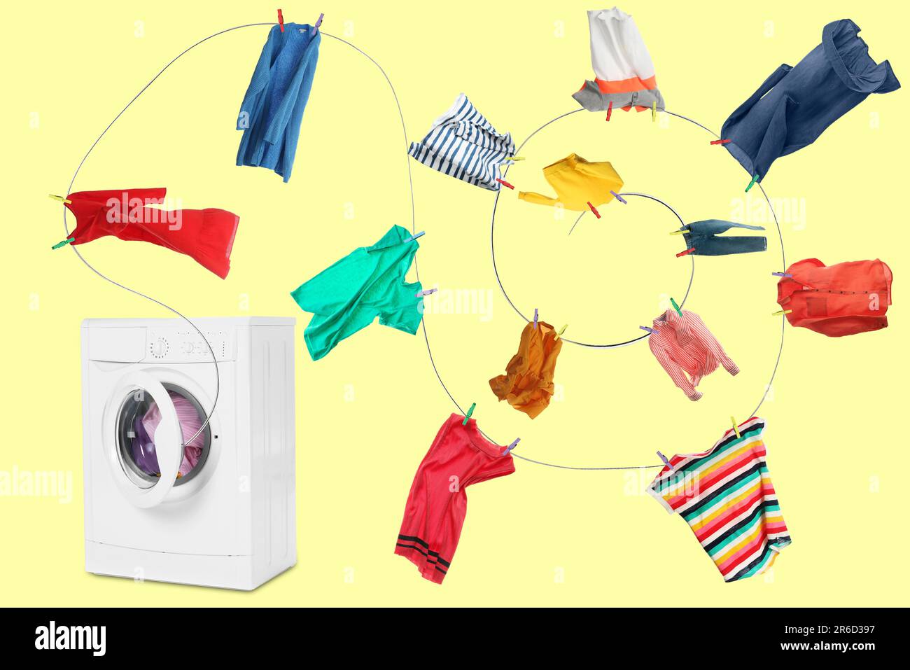 Drying laundry. Rope with different clothes flying out from washing ...