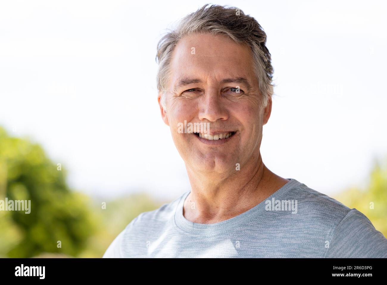 Senior handsome smiling man hi-res stock photography and images - Alamy