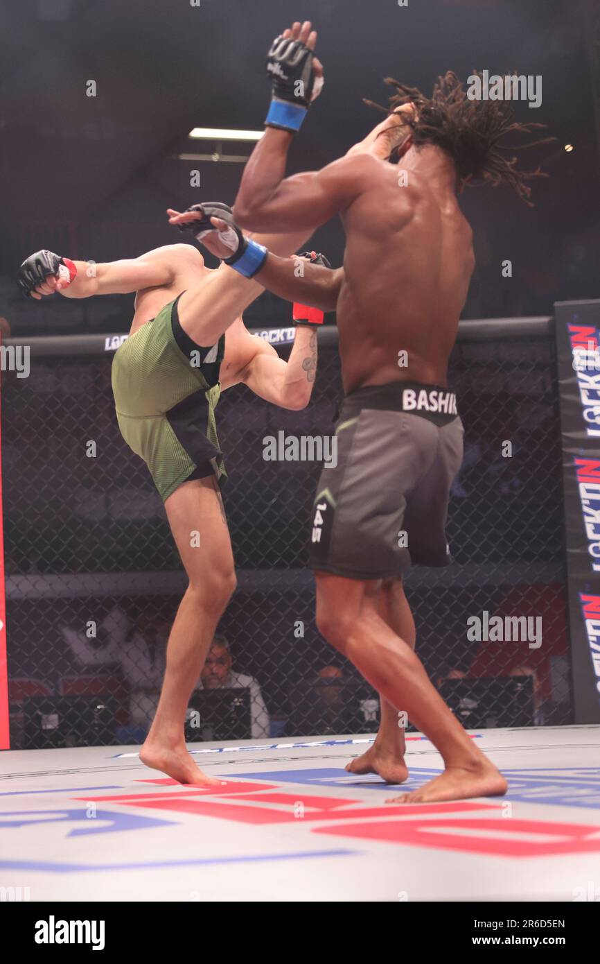 ATLANTA, GA - JUNE 08: (L-R) Alexei Pergande lands a head kick on Akeem ...