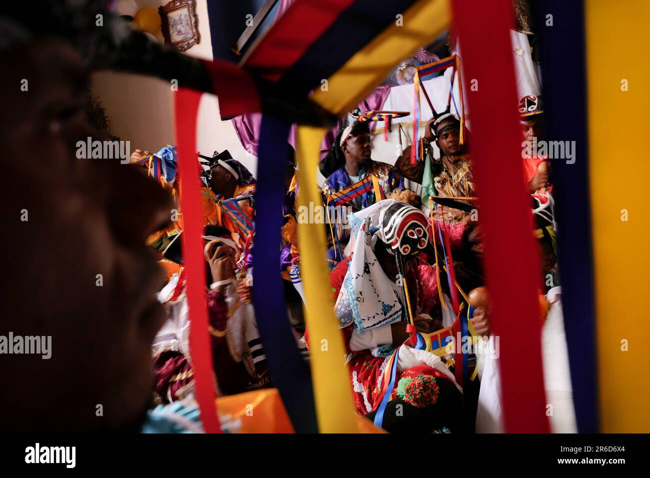 Penitents take part in a dancing devils procession in the annual ...