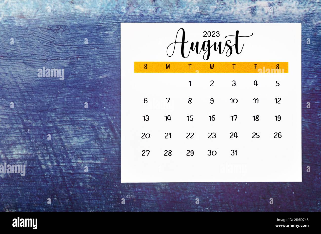 August 2023 Monthly calendar for 2023 year on old blue wooden ...