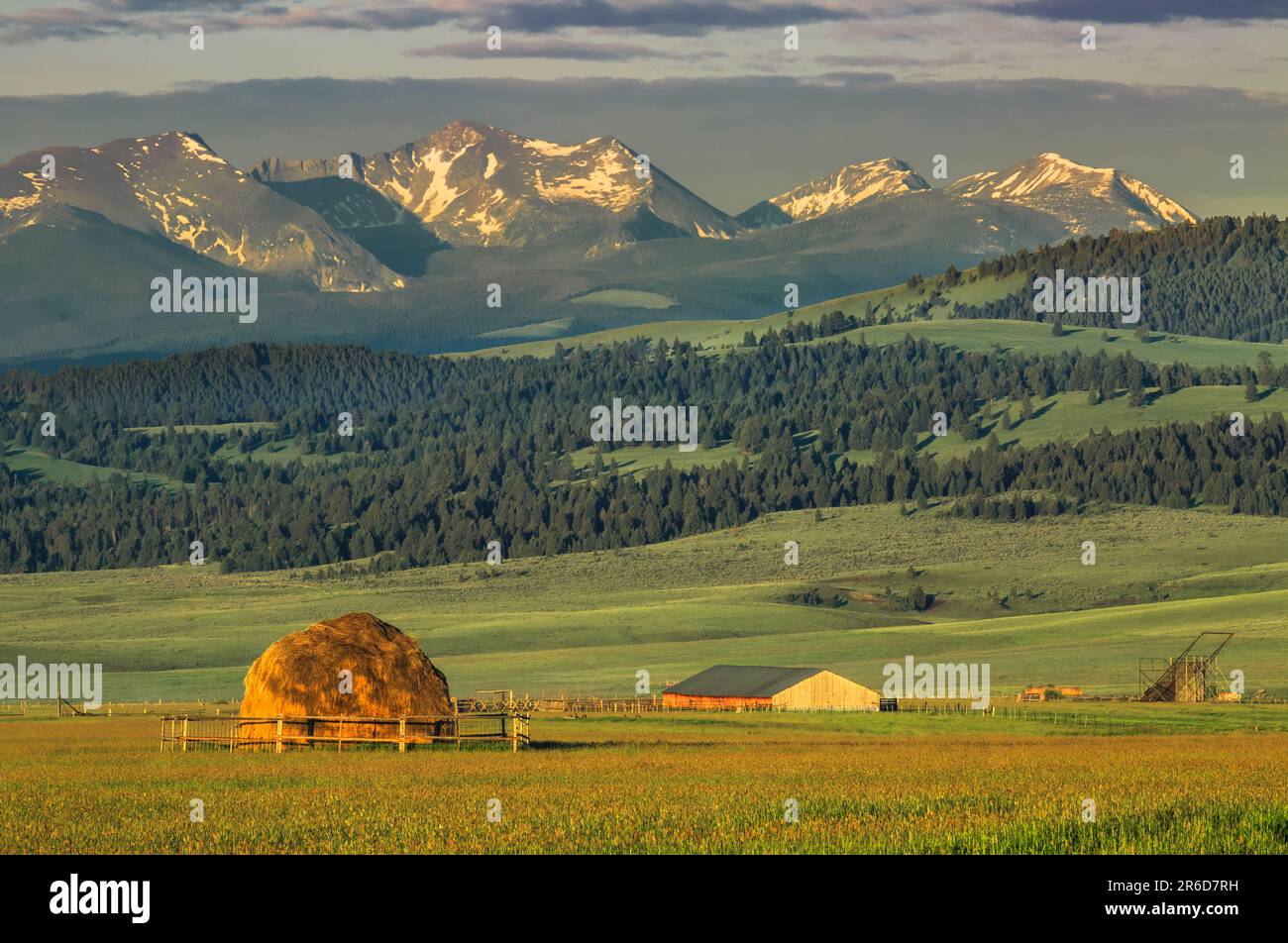 haystack in a meadow below the flint creek range near avon, montana ...