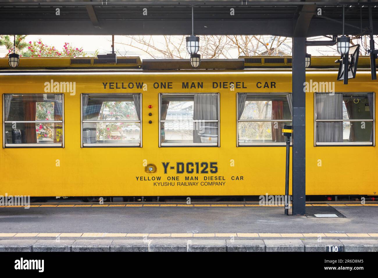 Yufuin, Japan - Nov 27 2022: The "Yellow One Man Diesel Car" (Kiha Y ...
