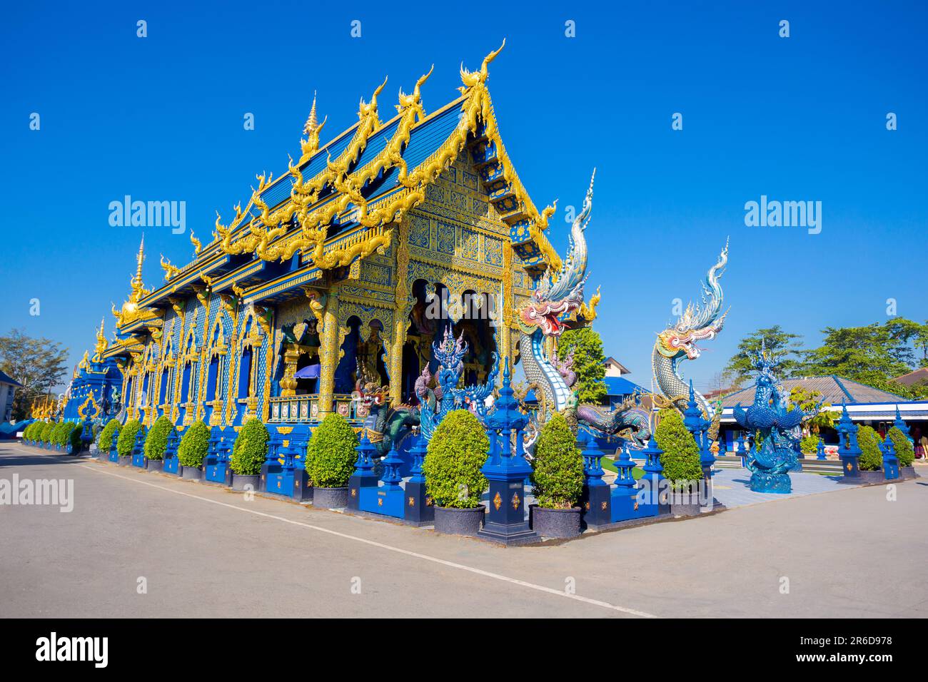 Wat Rong Suea Ten, or Blue Temple in Thai Lanna style in Chiang Rai ...