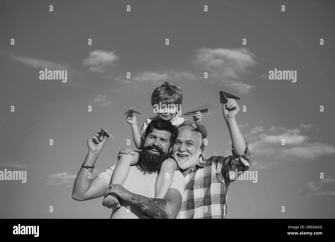 Family generation: future dream and people concept. Boy with father and ...