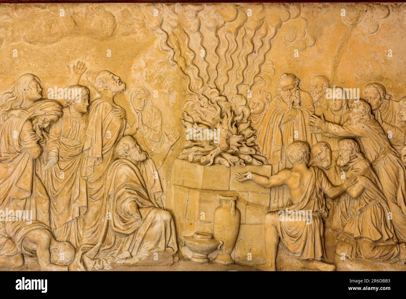 A bas-relief depicting the fire of God falling on and consuming Elijah ...