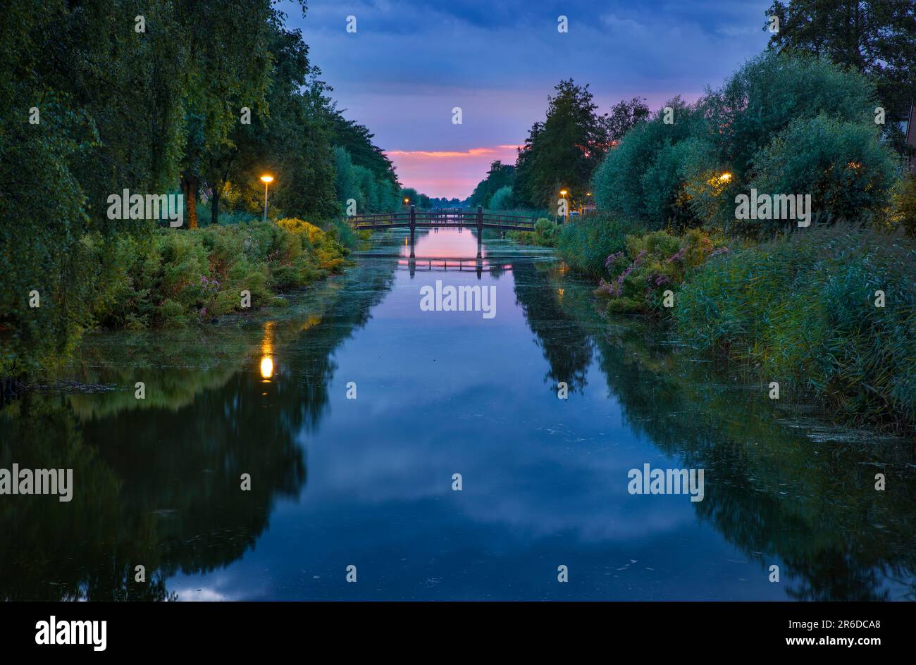 Colorful landscape of canal and bridge Stock Photo - Alamy
