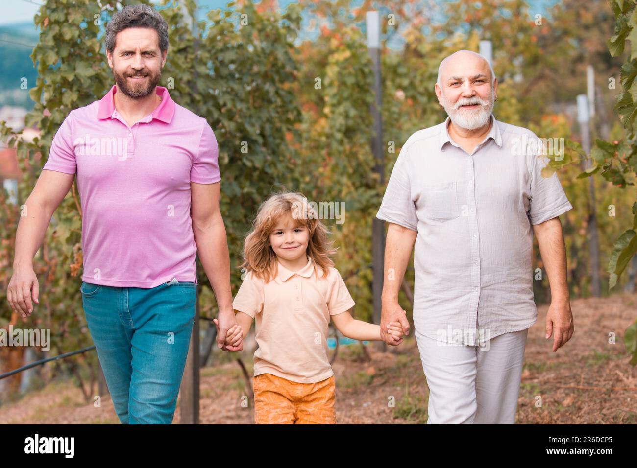 Family different generations walking hi-res stock photography and ...