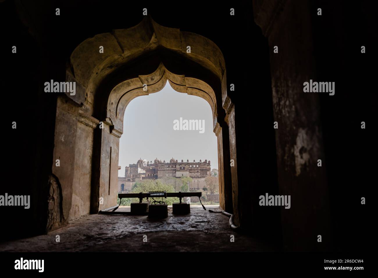 A view of a historic town from the inside of an open arched window in ...