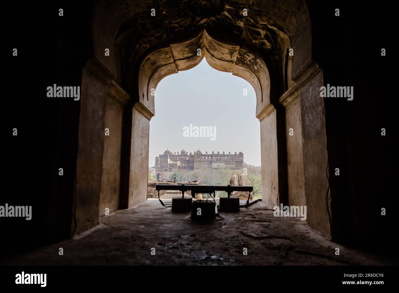 A view of a historic town from the inside of an open arched window in ...