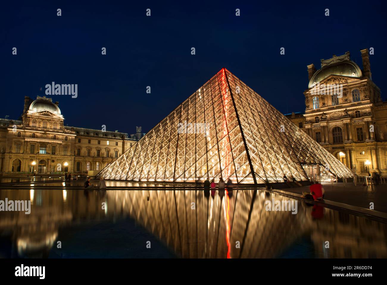 Beautiful facade of the louvre palace in paris at night hi-res stock ...