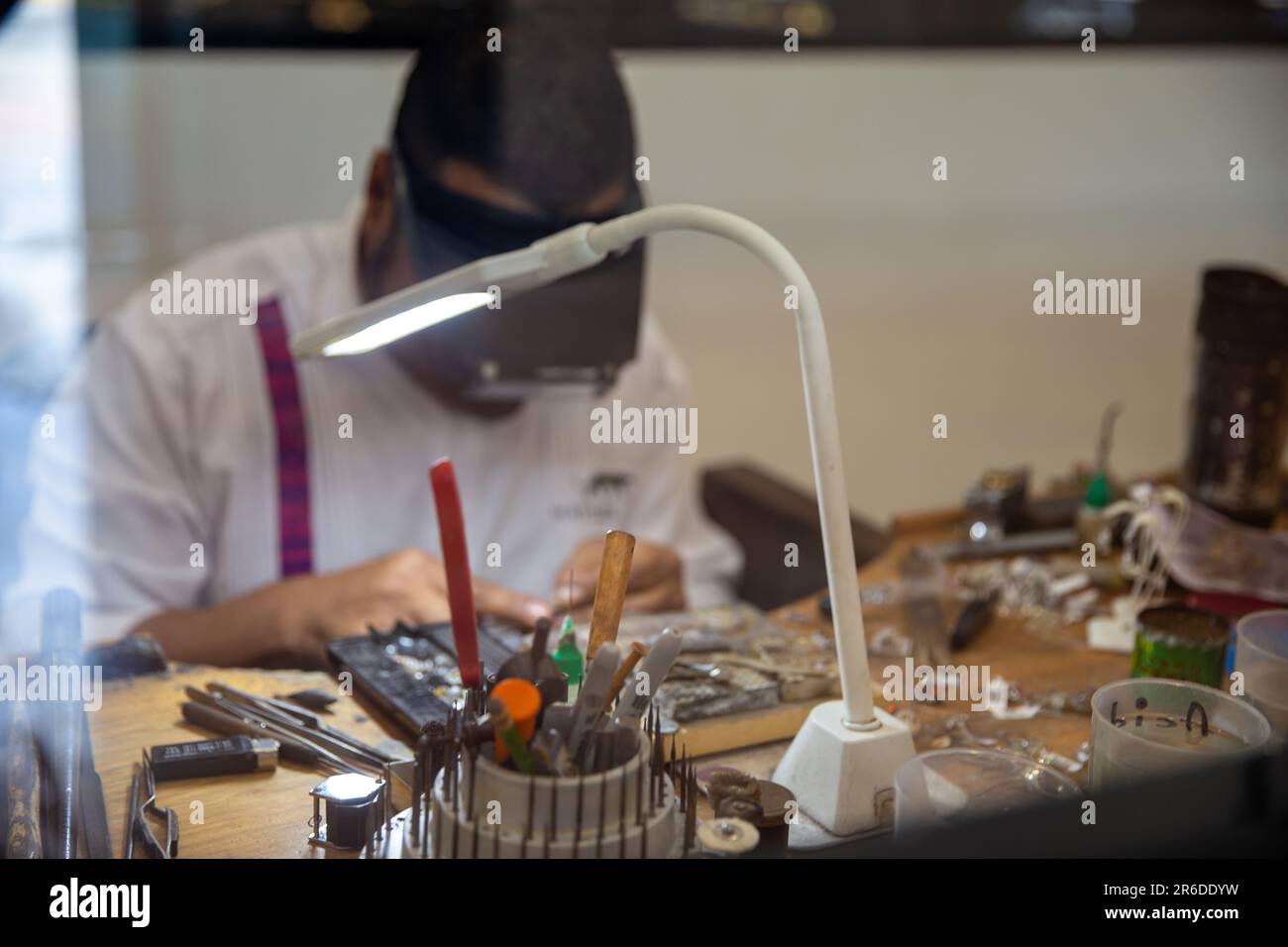 Artisan Work shop Man repairing a watch Stock Photo - Alamy