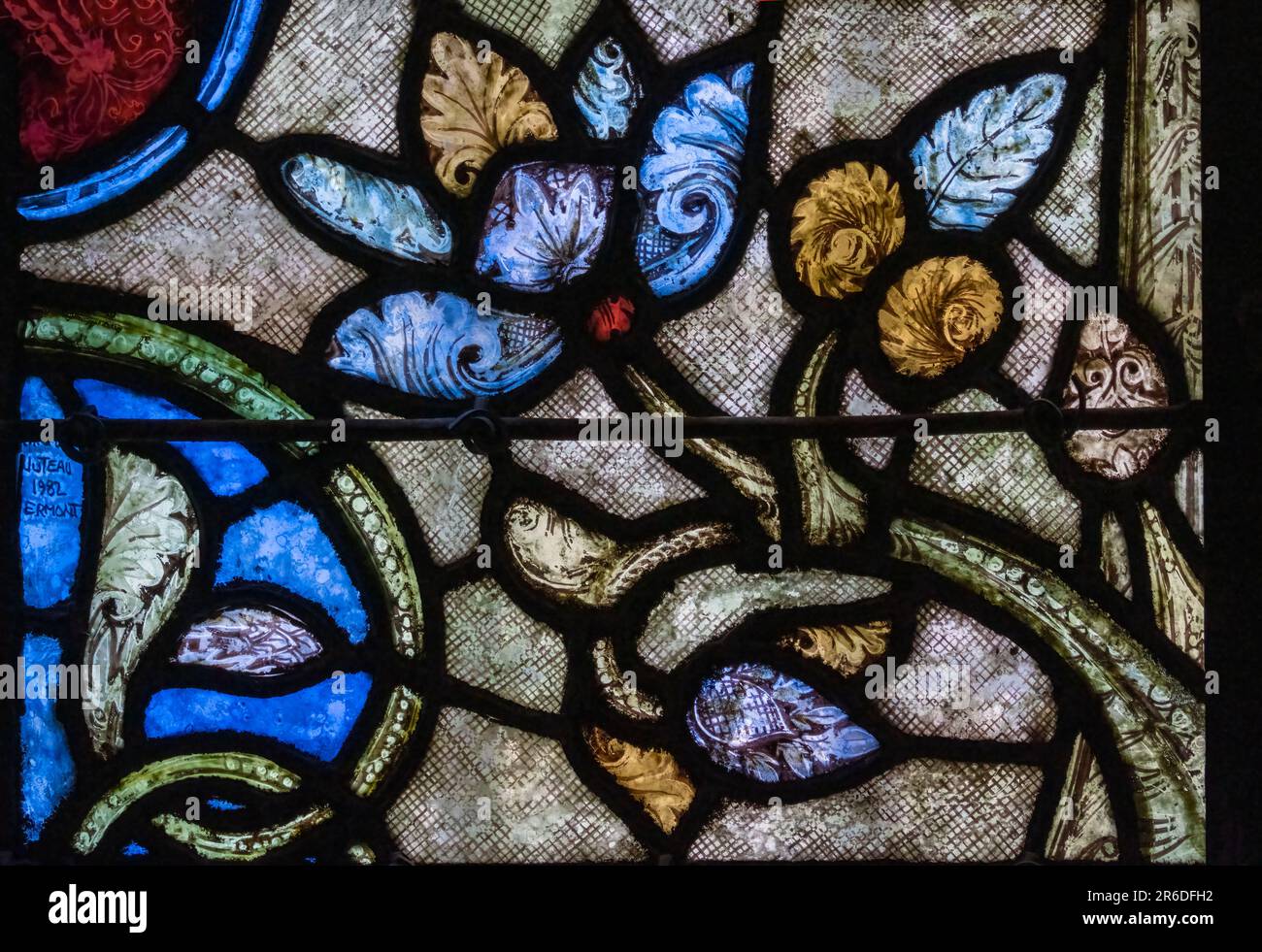 Stained glass window in a cathedral depicting a medieval floral motif ...