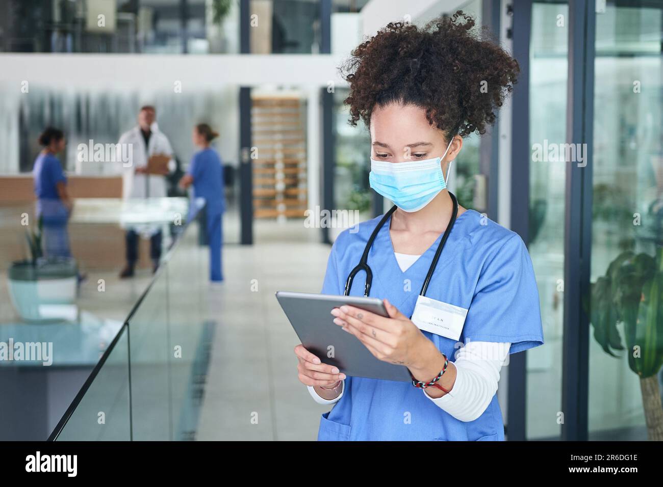 Technology limits chaos in the clinic. an attractive young nurse ...