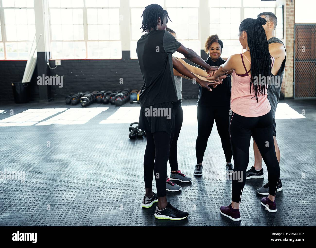 All about that fitness. a cheerful young group of people forming a ...