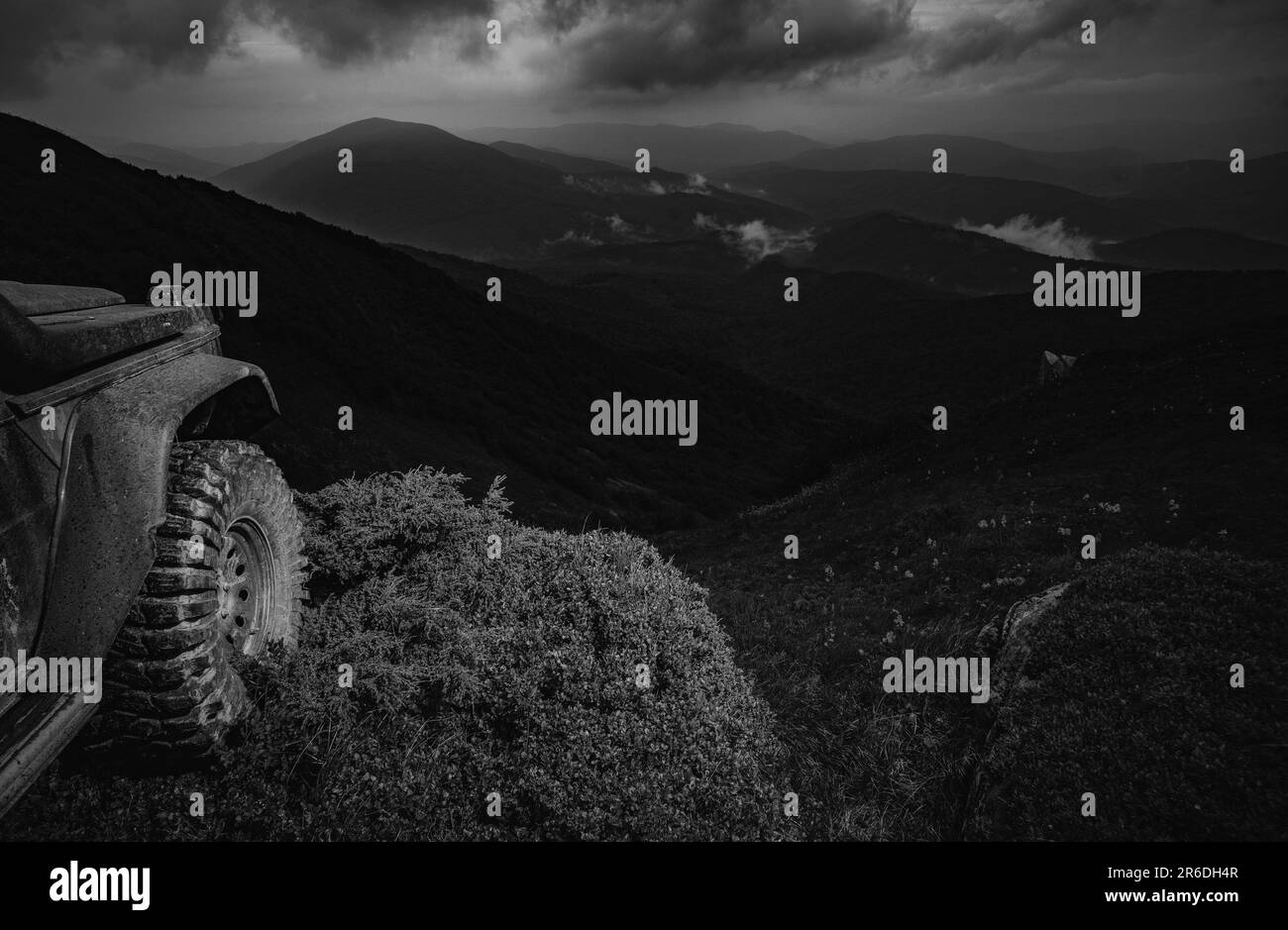 Off-road vehicle stuck on impenetrable road after rain in the ...