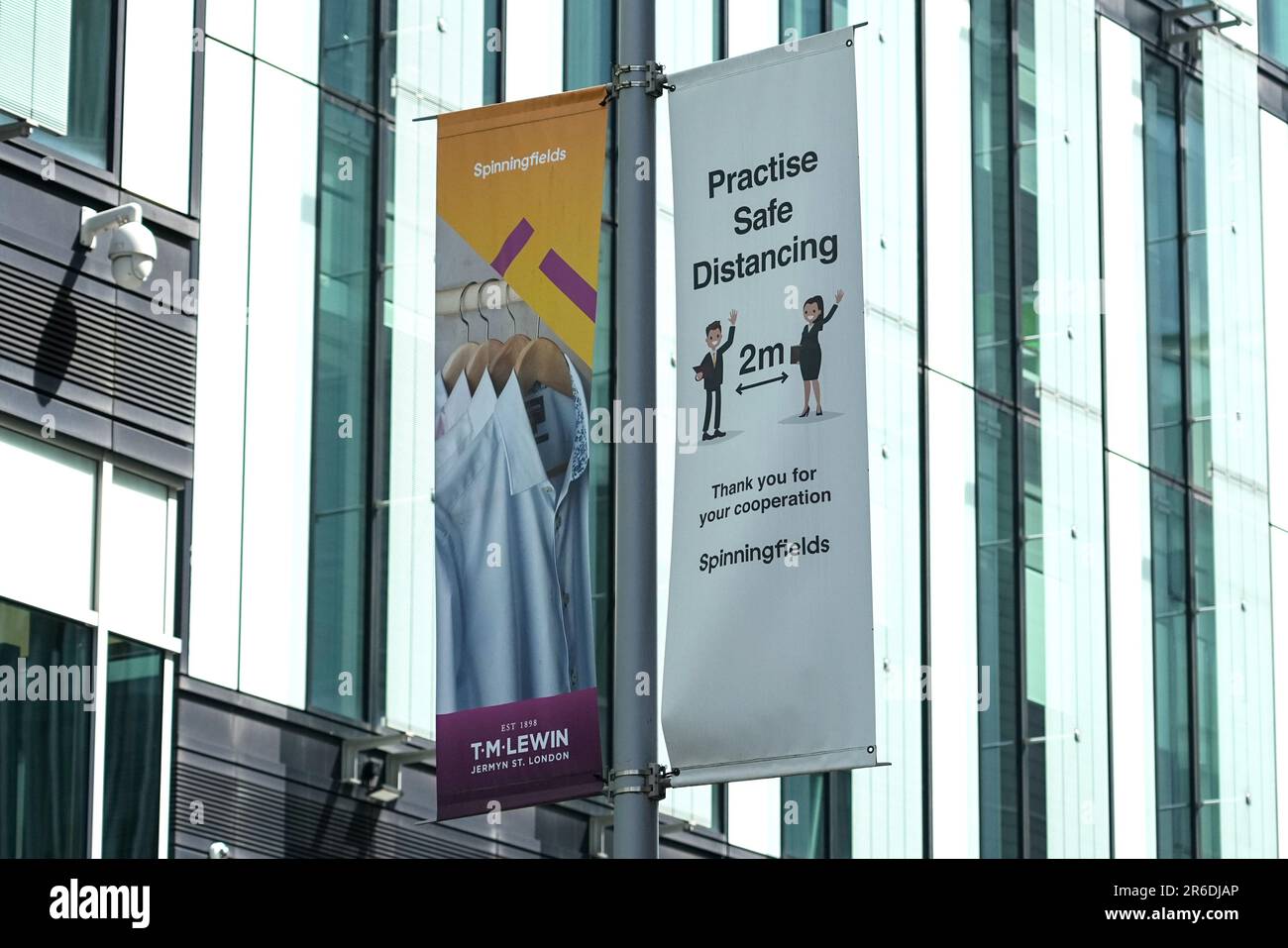 Safe Distance sign. Spinningfields Manchester Stock Photo - Alamy