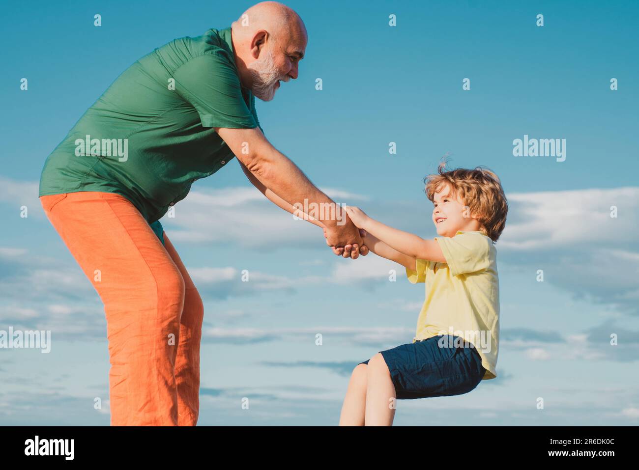 Old and young - aged concept The unruly child refused to obey his ...