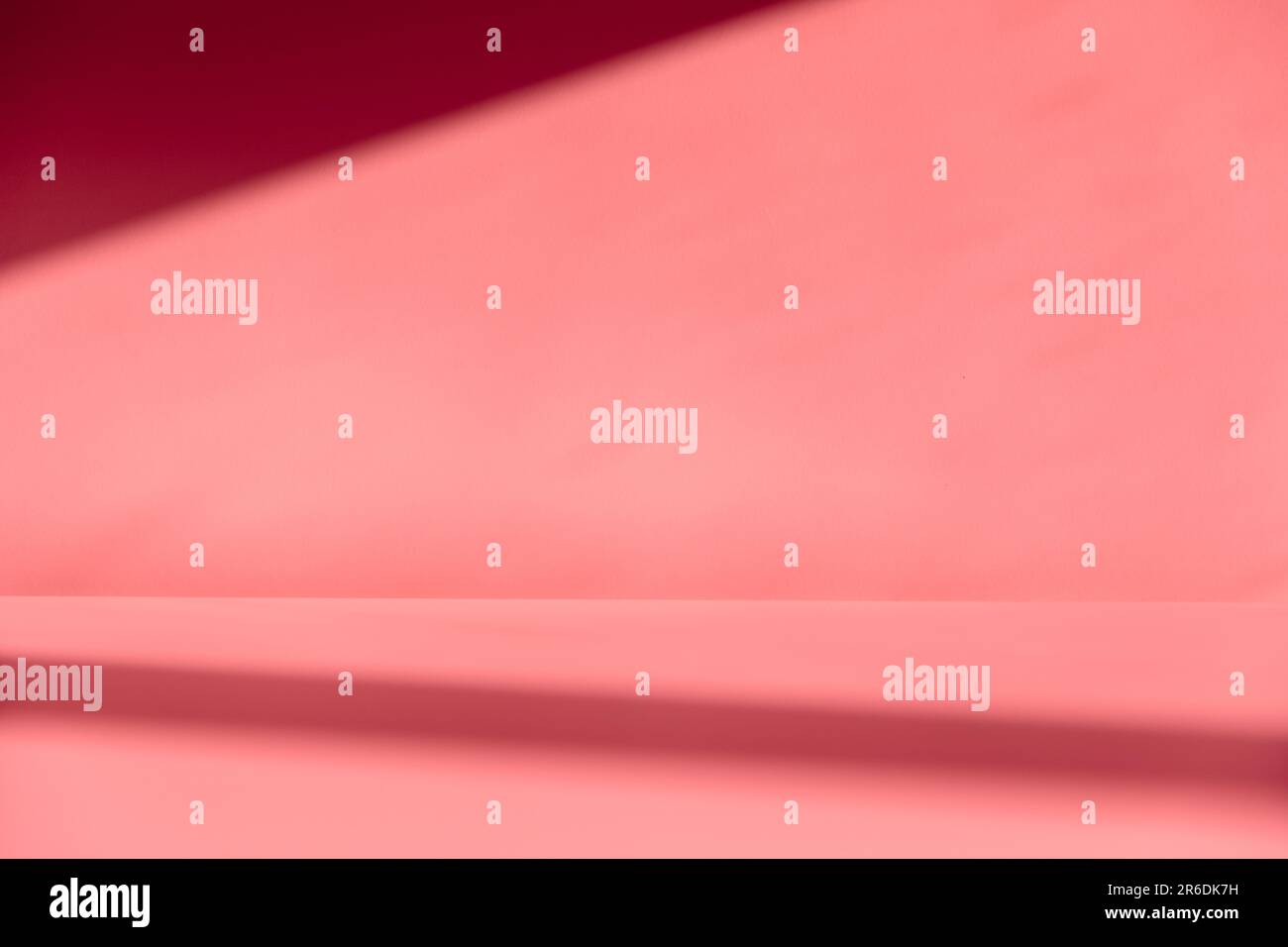 Red background for product presentation with shadow and light from ...