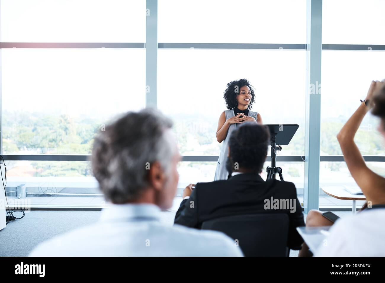 Seminar, presentation and woman presenter in the office boardroom for a ...