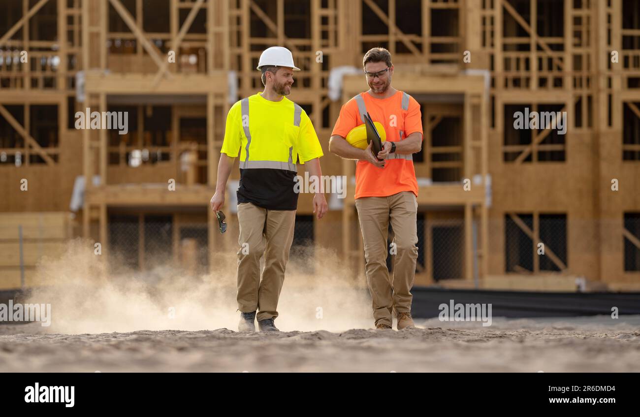 cheerful architect men with construction project. architect men ...